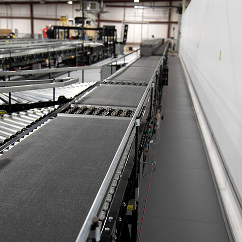 Pivot Wheel Sortation Conveyor | Hytrol